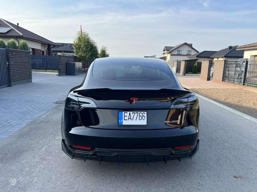 Black Tesla Model 3 2020 in Siauliai, with an engine capacity of 0.00 L and mileage of 66 thousand km for 24500 €, photo 6 on AUTOMOTO.COM.LV