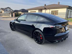 Black Tesla Model 3 2020 in Siauliai, with an engine capacity of 0.00 L and mileage of 66 thousand km for 24500 €, photo 7 on AUTOMOTO.COM.LV