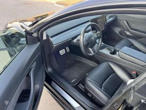 Black Tesla Model 3 2020 in Siauliai, with an engine capacity of 0.00 L and mileage of 66 thousand km for 24500 €, photo 11 on AUTOMOTO.COM.LV