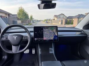Black Tesla Model 3 2020 in Siauliai, with an engine capacity of 0.00 L and mileage of 66 thousand km for 24500 €, photo 12 on AUTOMOTO.COM.LV
