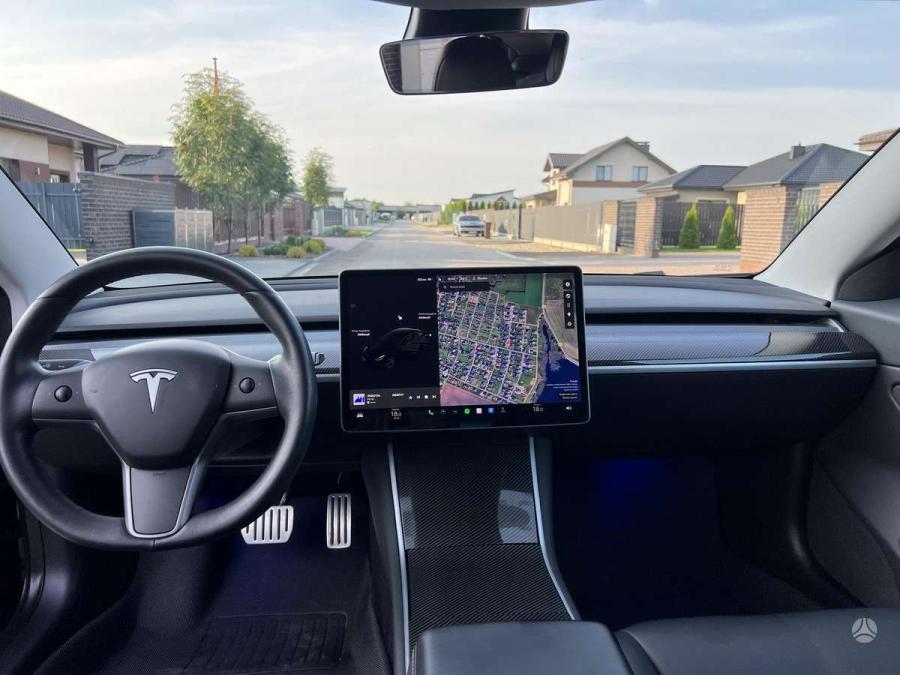Black Tesla Model 3 2020 in Siauliai, with an engine capacity of 0.00 L and mileage of 66 thousand km for 24500 €, photo 12 on AUTOMOTO.COM.LV