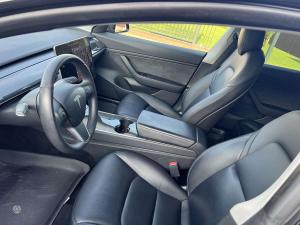 Black Tesla Model 3 2020 in Siauliai, with an engine capacity of 0.00 L and mileage of 66 thousand km for 24500 €, photo 13 on AUTOMOTO.COM.LV