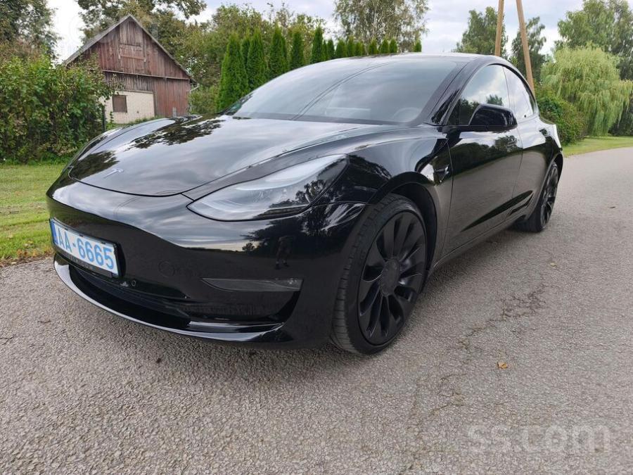 Black Tesla Model 3 2020 in Riga, with an engine capacity of 0.00 L and mileage of 69 thousand km for 28000 €, photo 1 on AUTOMOTO.COM.LV