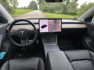 Black Tesla Model 3 2020 in Riga, with an engine capacity of 0.00 L and mileage of 69 thousand km for 28000 €, photo 6 on AUTOMOTO.COM.LV