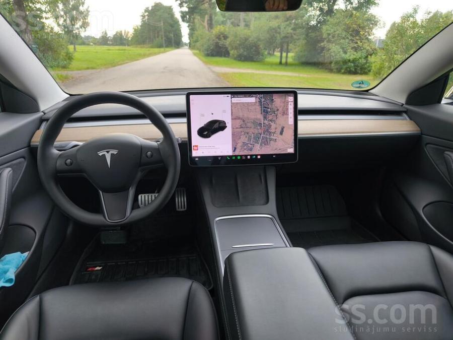 Black Tesla Model 3 2020 in Riga, with an engine capacity of 0.00 L and mileage of 69 thousand km for 28000 €, photo 6 on AUTOMOTO.COM.LV