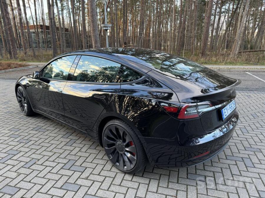 Black Tesla Model 3 2021 in Riga, with an engine capacity of 0.00 L and mileage of 110 thousand km for 25900 €, photo 6 on AUTOMOTO.COM.LV