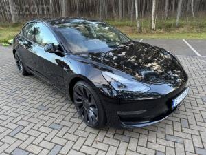 Black Tesla Model 3 2021 in Riga, with an engine capacity of 0.00 L and mileage of 110 thousand km for 25900 €, photo 12 on AUTOMOTO.COM.LV