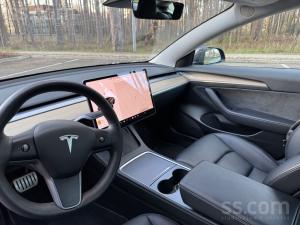 Black Tesla Model 3 2021 in Riga, with an engine capacity of 0.00 L and mileage of 110 thousand km for 25900 €, photo 13 on AUTOMOTO.COM.LV