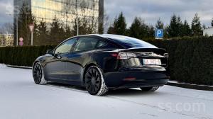 Black Tesla Model 3 2021 in Riga, with an engine capacity of 0.00 L and mileage of 133 thousand km for 24950 €, photo 6 on AUTOMOTO.COM.LV