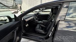 Black Tesla Model 3 2021 in Riga, with an engine capacity of 0.00 L and mileage of 133 thousand km for 24950 €, photo 7 on AUTOMOTO.COM.LV
