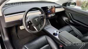 Black Tesla Model 3 2021 in Riga, with an engine capacity of 0.00 L and mileage of 133 thousand km for 24950 €, photo 20 on AUTOMOTO.COM.LV