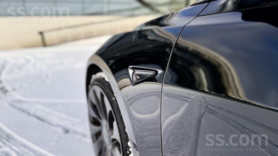Black Tesla Model 3 2021 in Riga, with an engine capacity of 0.00 L and mileage of 133 thousand km for 24950 €, photo 21 on AUTOMOTO.COM.LV