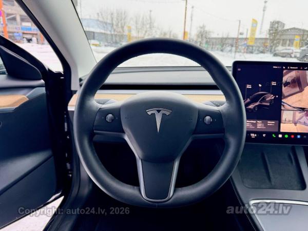 Black Tesla Model 3 2021 in Tallinn, with an engine capacity of 0.00 L and mileage of 57 thousand km for 24900 €, photo 7 on AUTOMOTO.COM.LV