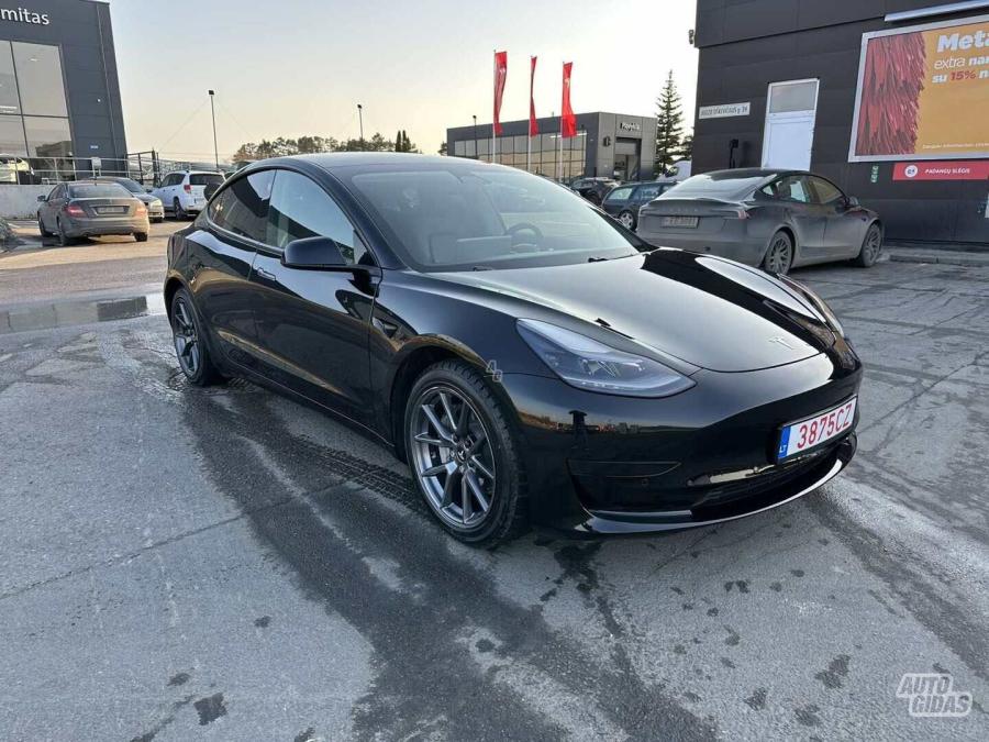 Black Tesla Model 3 2021 in Vilnius, with an engine capacity of 0.00 L and mileage of 86 thousand km for 18500 €, photo 2 on AUTOMOTO.COM.LV