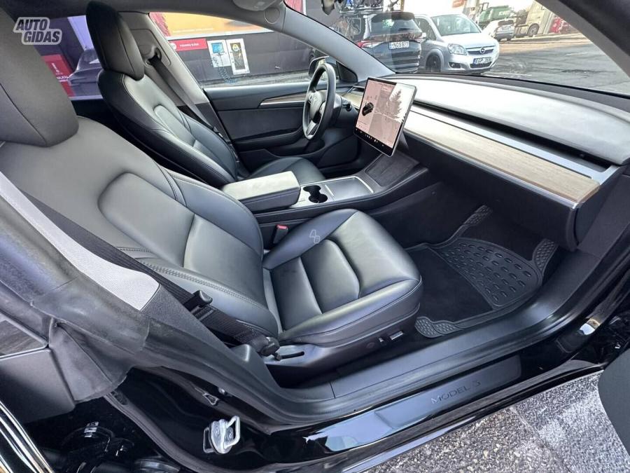 Black Tesla Model 3 2021 in Vilnius, with an engine capacity of 0.00 L and mileage of 86 thousand km for 18500 €, photo 13 on AUTOMOTO.COM.LV