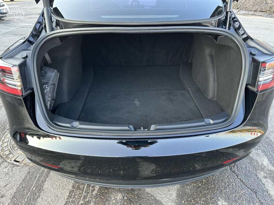 Black Tesla Model 3 2021 in Vilnius, with an engine capacity of 0.00 L and mileage of 86 thousand km for 18500 €, photo 18 on AUTOMOTO.COM.LV