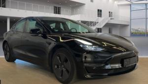 Black Tesla Model 3 2021 in Riga, with an engine capacity of 0.00 L and mileage of 98 thousand km for 24490 €, photo  on AUTOMOTO.COM.LV