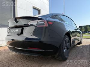 Black Tesla Model 3 2021 in Riga, with an engine capacity of 0.00 L and mileage of 60 thousand km for 27500 €, photo 5 on AUTOMOTO.COM.LV