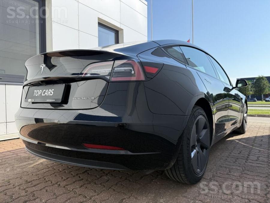 Black Tesla Model 3 2021 in Riga, with an engine capacity of 0.00 L and mileage of 60 thousand km for 27500 €, photo 5 on AUTOMOTO.COM.LV