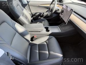 Black Tesla Model 3 2021 in Riga, with an engine capacity of 0.00 L and mileage of 60 thousand km for 27500 €, photo 8 on AUTOMOTO.COM.LV