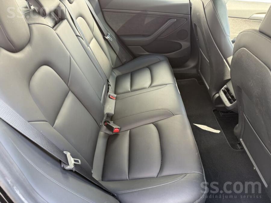 Black Tesla Model 3 2021 in Riga, with an engine capacity of 0.00 L and mileage of 60 thousand km for 27500 €, photo 10 on AUTOMOTO.COM.LV
