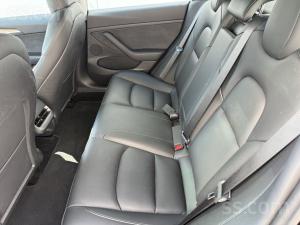 Black Tesla Model 3 2021 in Riga, with an engine capacity of 0.00 L and mileage of 60 thousand km for 27500 €, photo 11 on AUTOMOTO.COM.LV