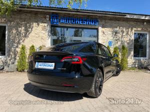 Black Tesla Model 3 2021 in Tallinn, with an engine capacity of 0.00 L and mileage of 70 thousand km for 32990 €, photo 3 on AUTOMOTO.COM.LV