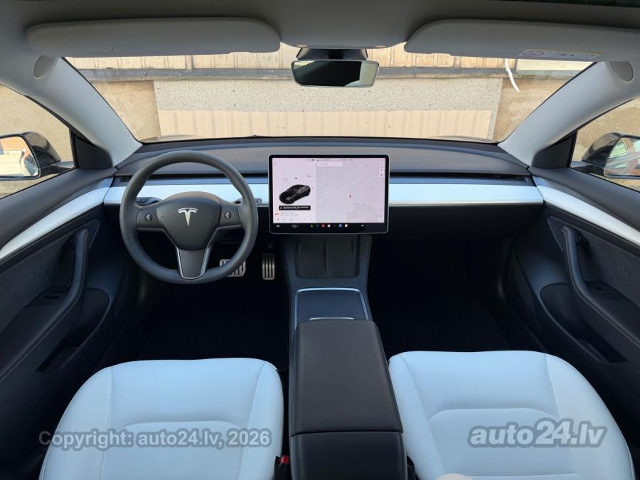 Black Tesla Model 3 2021 in Tallinn, with an engine capacity of 0.00 L and mileage of 70 thousand km for 32990 €, photo 5 on AUTOMOTO.COM.LV