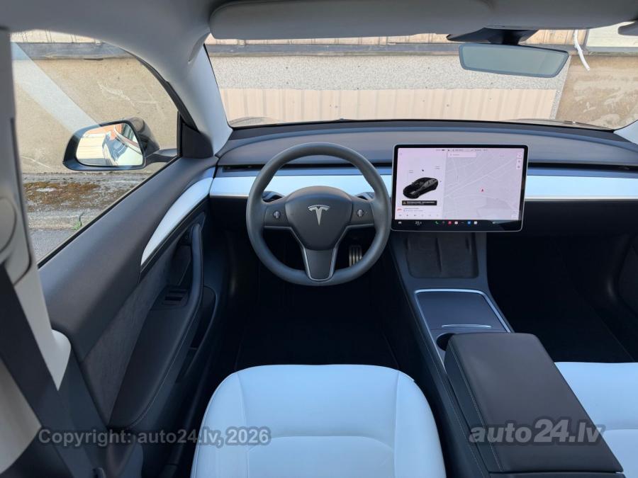 Black Tesla Model 3 2021 in Tallinn, with an engine capacity of 0.00 L and mileage of 70 thousand km for 32990 €, photo 6 on AUTOMOTO.COM.LV