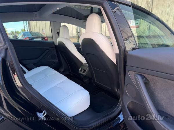 Black Tesla Model 3 2021 in Tallinn, with an engine capacity of 0.00 L and mileage of 70 thousand km for 32990 €, photo 8 on AUTOMOTO.COM.LV