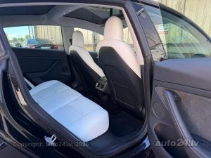 Black Tesla Model 3 2021 in Tallinn, with an engine capacity of 0.00 L and mileage of 70 thousand km for 32990 €, photo 9 on AUTOMOTO.COM.LV