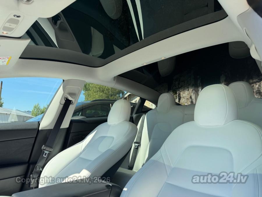 Black Tesla Model 3 2021 in Tallinn, with an engine capacity of 0.00 L and mileage of 70 thousand km for 32990 €, photo 10 on AUTOMOTO.COM.LV