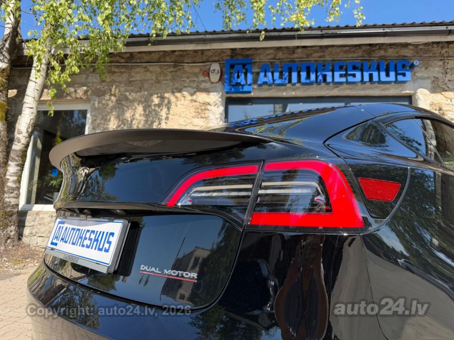 Black Tesla Model 3 2021 in Tallinn, with an engine capacity of 0.00 L and mileage of 70 thousand km for 32990 €, photo 20 on AUTOMOTO.COM.LV