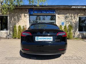 Black Tesla Model 3 2021 in Tallinn, with an engine capacity of 0.00 L and mileage of 70 thousand km for 32990 €, photo 21 on AUTOMOTO.COM.LV