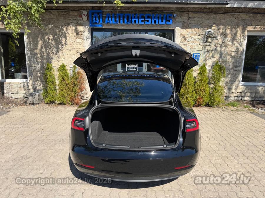 Black Tesla Model 3 2021 in Tallinn, with an engine capacity of 0.00 L and mileage of 70 thousand km for 32990 €, photo 22 on AUTOMOTO.COM.LV