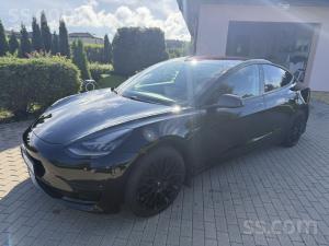 Black Tesla Model 3 2021 in Riga, with an engine capacity of 0.00 L and mileage of 119 thousand km for 24000 €, photo  on AUTOMOTO.COM.LV