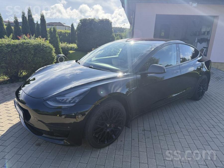 Black Tesla Model 3 2021 in Riga, with an engine capacity of 0.00 L and mileage of 119 thousand km for 24000 €, photo 1 on AUTOMOTO.COM.LV