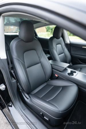 Black Tesla Model 3 2021 in Parnu, with an engine capacity of 0.00 L and mileage of 118 thousand km for 25990 €, photo 14 on AUTOMOTO.COM.LV