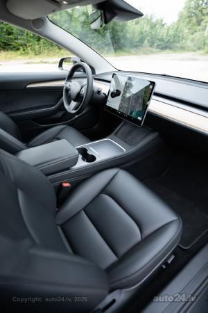 Black Tesla Model 3 2021 in Parnu, with an engine capacity of 0.00 L and mileage of 118 thousand km for 25990 €, photo 15 on AUTOMOTO.COM.LV