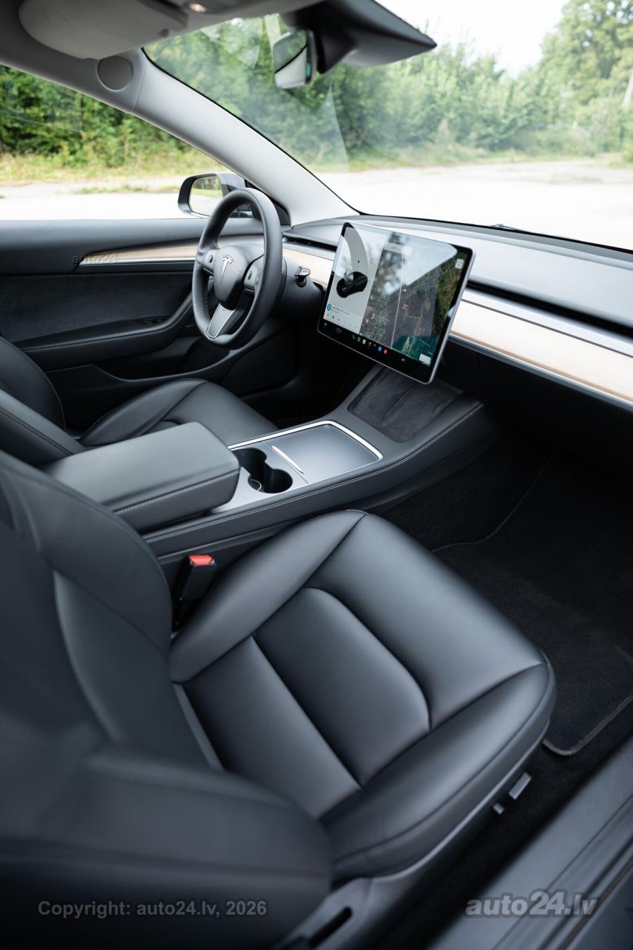 Black Tesla Model 3 2021 in Parnu, with an engine capacity of 0.00 L and mileage of 118 thousand km for 25990 €, photo 15 on AUTOMOTO.COM.LV