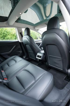 Black Tesla Model 3 2021 in Parnu, with an engine capacity of 0.00 L and mileage of 118 thousand km for 25990 €, photo 16 on AUTOMOTO.COM.LV
