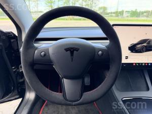 Black Tesla Model 3 2022 in Riga, with an engine capacity of 0.00 L and mileage of 134 thousand km for 27800 €, photo  on AUTOMOTO.COM.LV