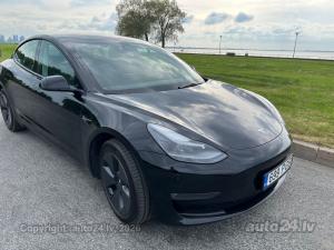 Black Tesla Model 3 2022 in Tallinn, with an engine capacity of 0.00 L and mileage of 144 thousand km for 30990 €, photo 5 on AUTOMOTO.COM.LV