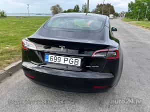 Black Tesla Model 3 2022 in Tallinn, with an engine capacity of 0.00 L and mileage of 144 thousand km for 30990 €, photo 12 on AUTOMOTO.COM.LV