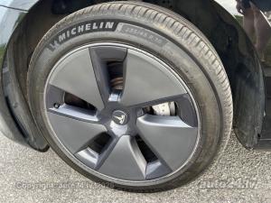 Black Tesla Model 3 2022 in Tallinn, with an engine capacity of 0.00 L and mileage of 144 thousand km for 30990 €, photo 17 on AUTOMOTO.COM.LV