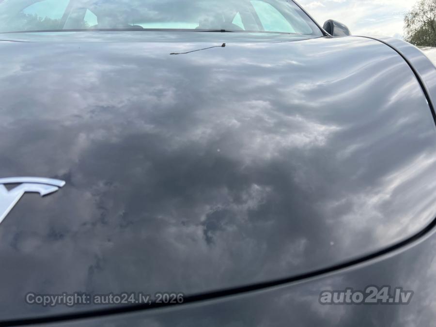 Black Tesla Model 3 2022 in Tallinn, with an engine capacity of 0.00 L and mileage of 144 thousand km for 30990 €, photo 19 on AUTOMOTO.COM.LV