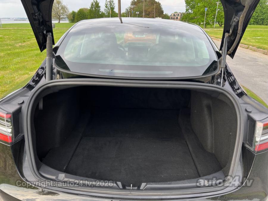 Black Tesla Model 3 2022 in Tallinn, with an engine capacity of 0.00 L and mileage of 144 thousand km for 30990 €, photo 21 on AUTOMOTO.COM.LV
