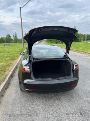 Black Tesla Model 3 2022 in Tallinn, with an engine capacity of 0.00 L and mileage of 144 thousand km for 30990 €, photo 23 on AUTOMOTO.COM.LV
