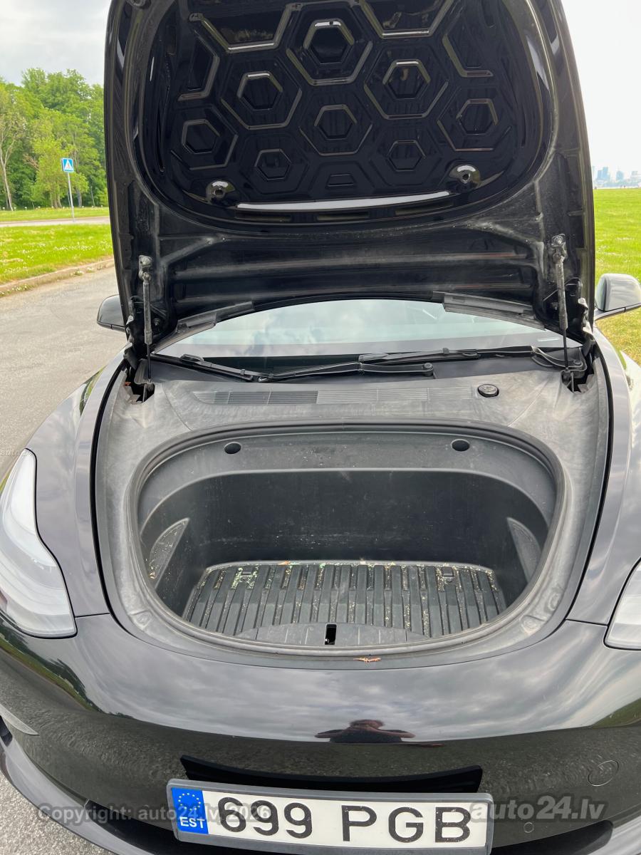 Black Tesla Model 3 2022 in Tallinn, with an engine capacity of 0.00 L and mileage of 144 thousand km for 30990 €, photo 24 on AUTOMOTO.COM.LV