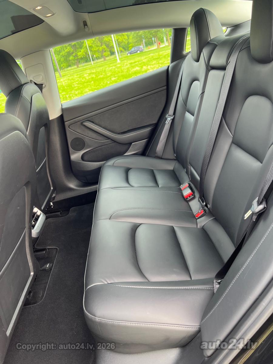 Black Tesla Model 3 2022 in Tallinn, with an engine capacity of 0.00 L and mileage of 144 thousand km for 30990 €, photo 25 on AUTOMOTO.COM.LV